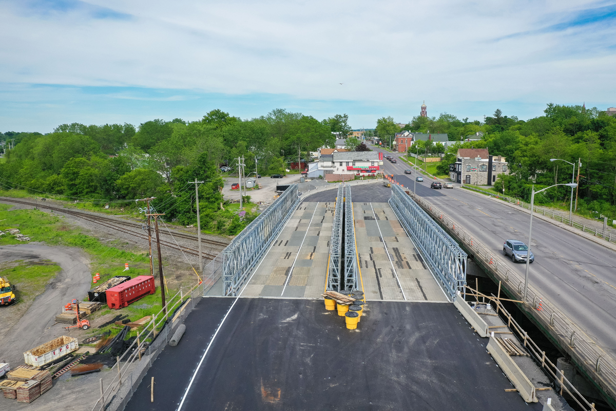 Aerial photos of temporary bridge over railroad tracks on Arsenal ...